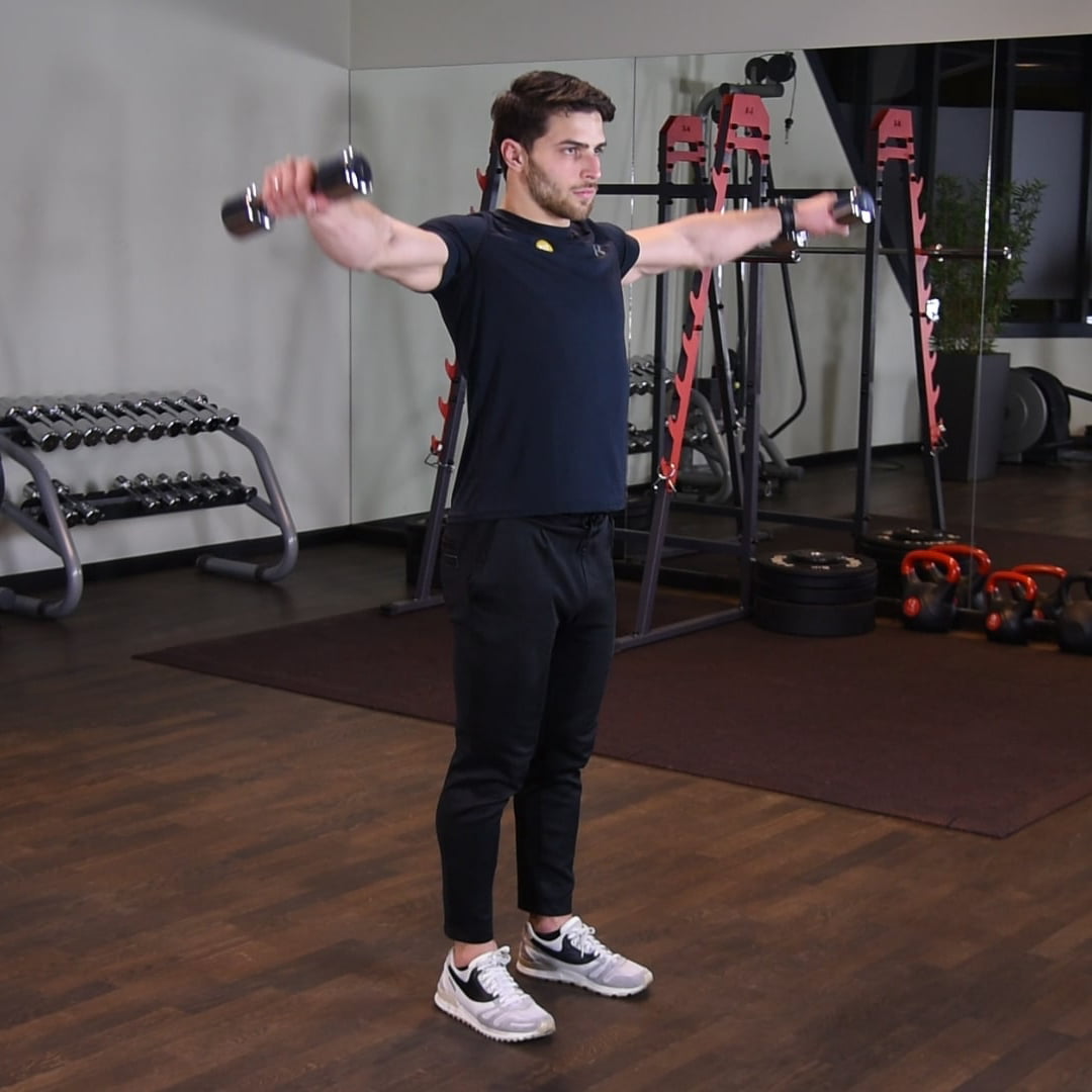 Unoszenie hantli na boki w staniu - od Just be FIT - Zobacz wideo!